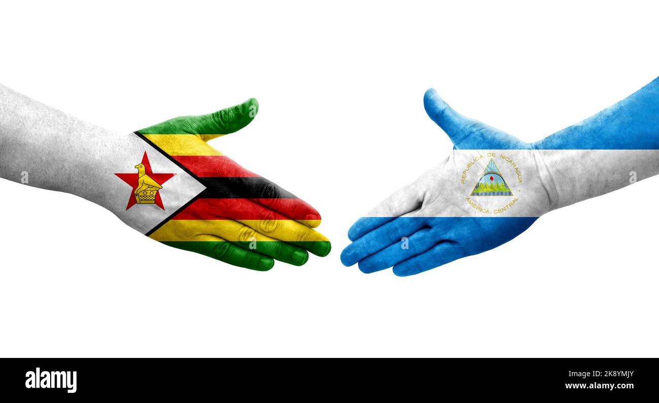 Handshake between Nicaragua and Zimbabwe flags painted on hands ...