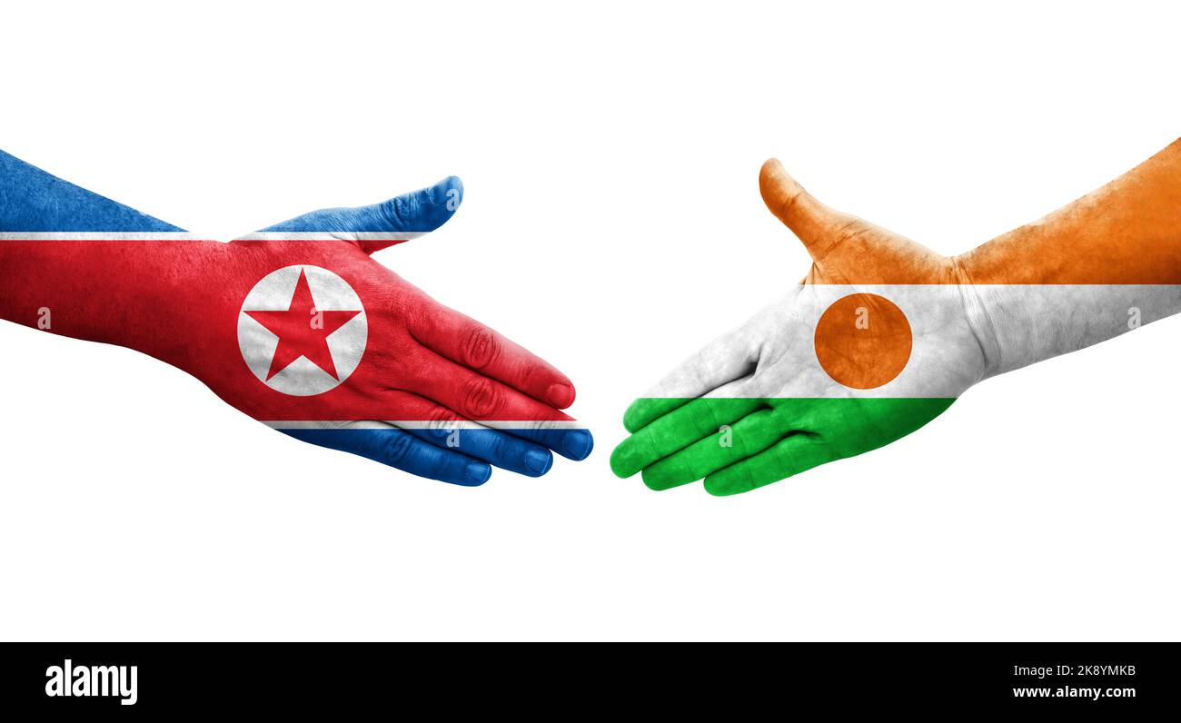 Handshake between Niger and North Korea flags painted on hands ...