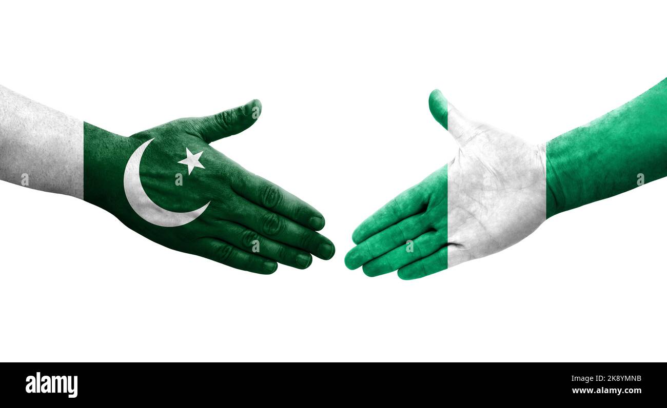 Handshake between Nigeria and Pakistan flags painted on hands, isolated ...