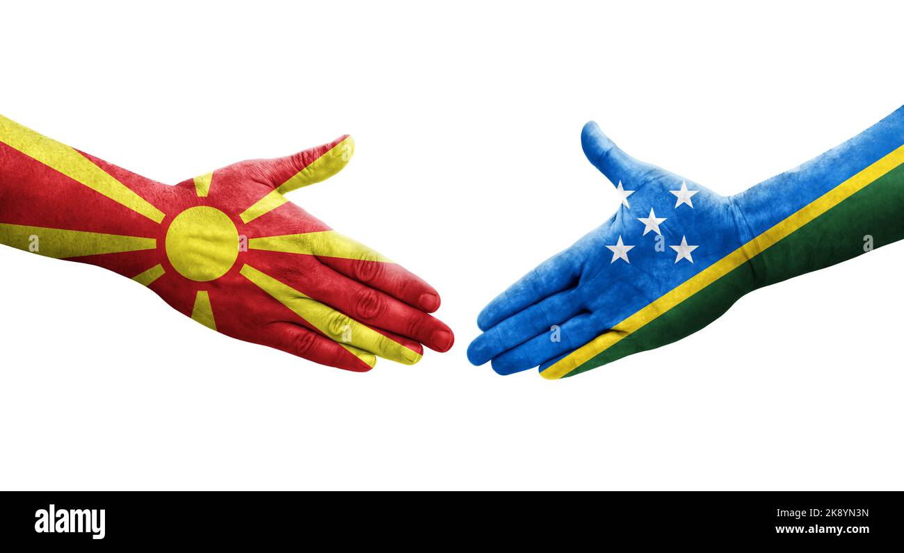 Handshake between North Macedonia and Solomon Islands flags painted on ...