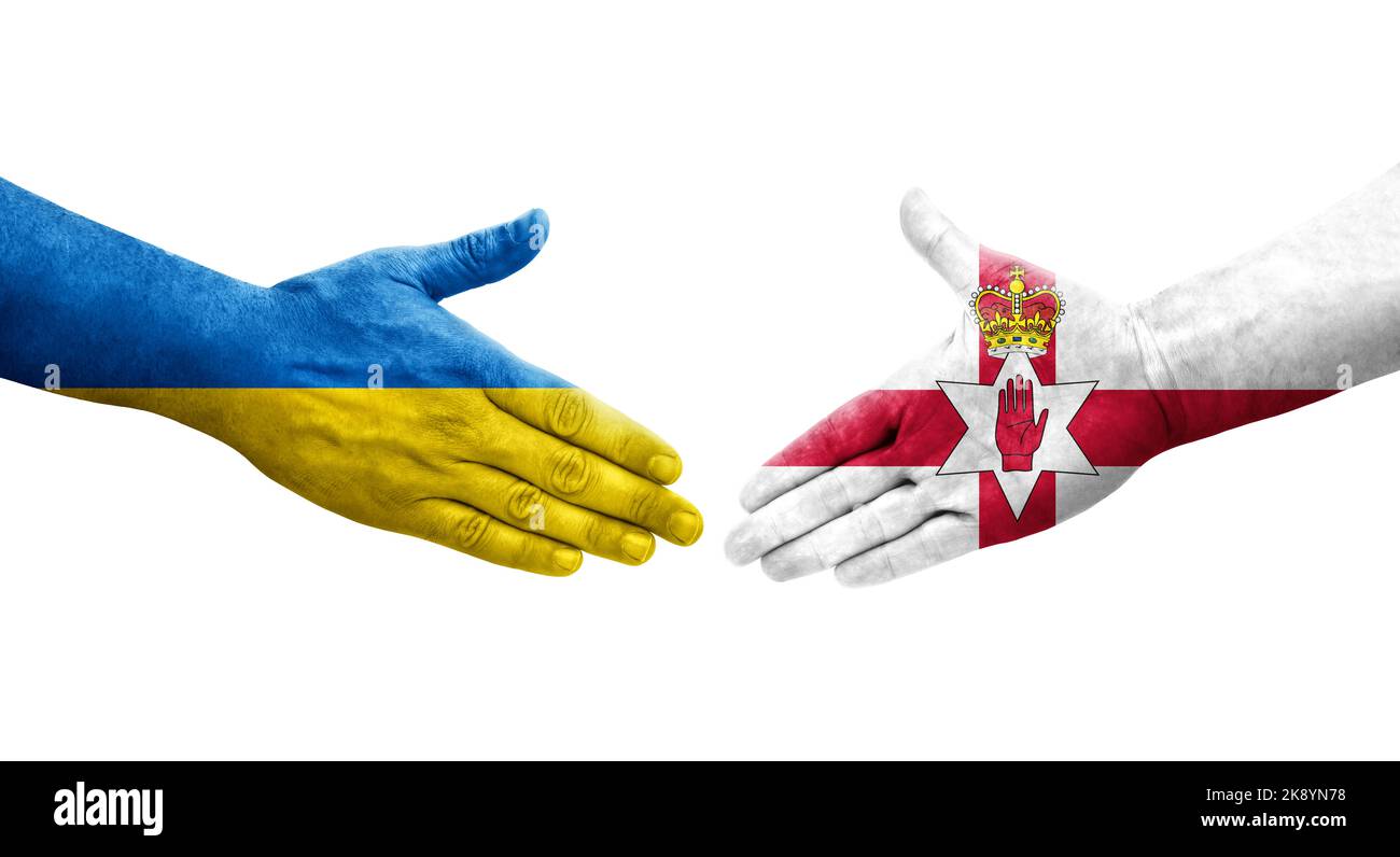 Handshake between Northern Ireland and Ukraine flags painted on hands ...