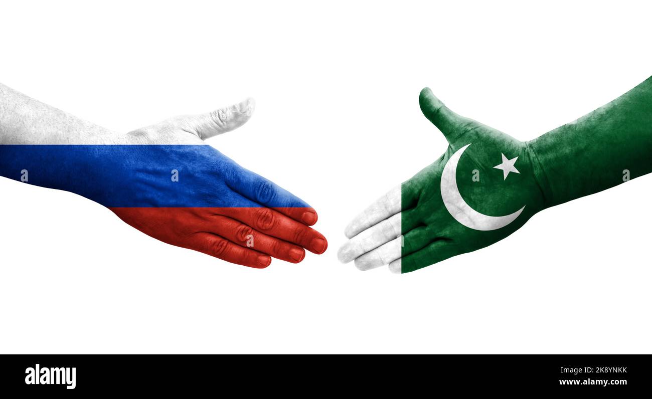 Handshake between Pakistan and Russia flags painted on hands, isolated ...