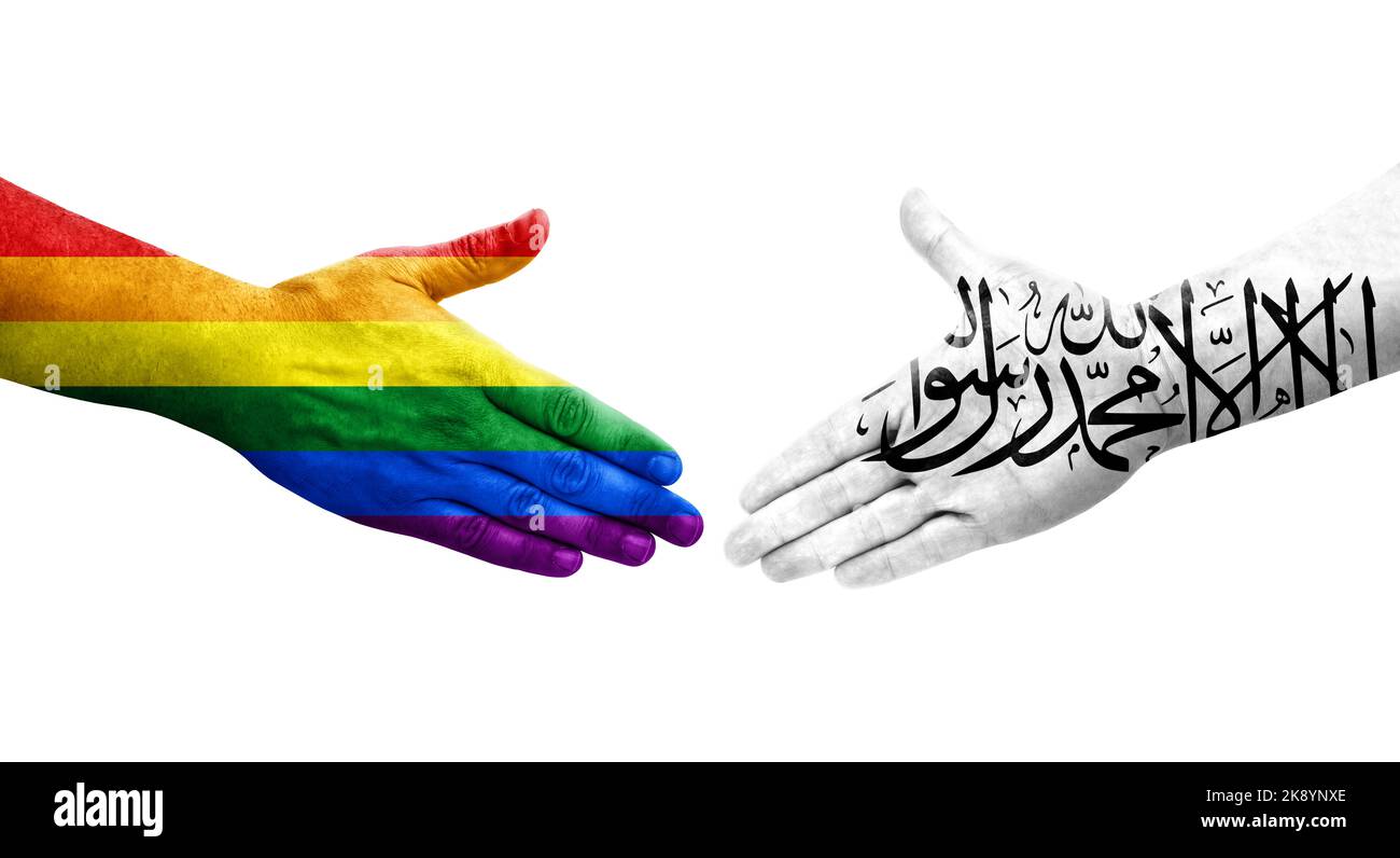 Handshake between Palestine and LGBT flags painted on hands, isolated ...
