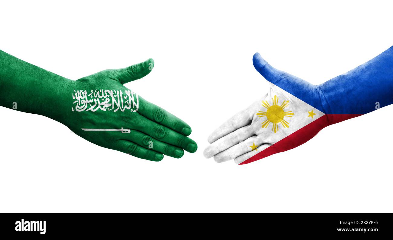 Handshake between Philippines and Saudi Arabia flags painted on hands ...