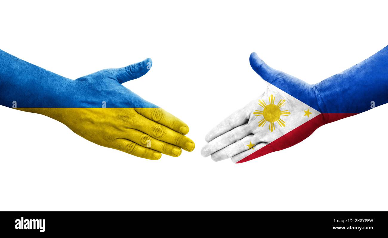 Handshake between Philippines and Ukraine flags painted on hands ...