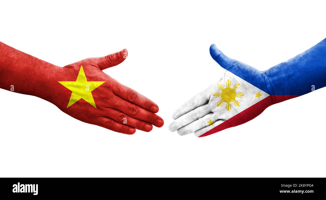 Handshake between Philippines and Vietnam flags painted on hands ...