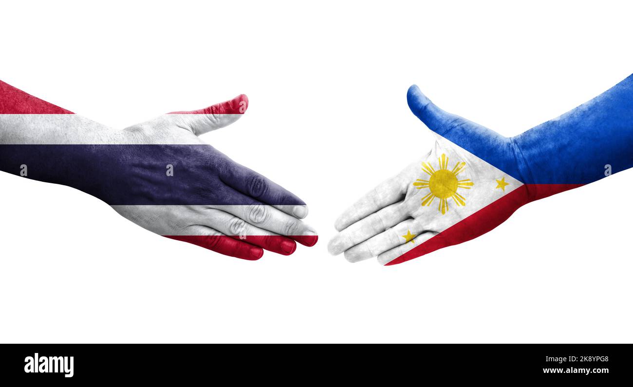Handshake between Philippines and Thailand flags painted on hands ...
