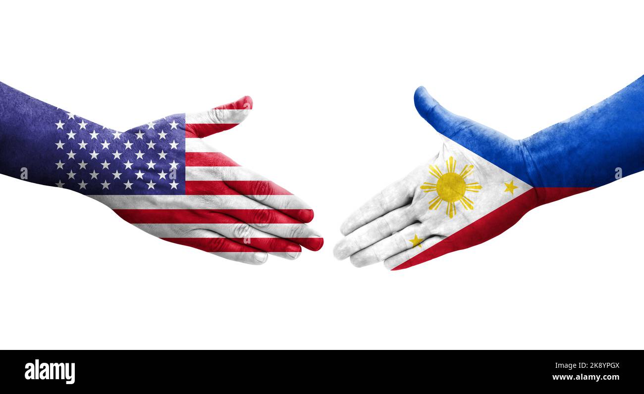 Handshake between Philippines and USA flags painted on hands, isolated ...