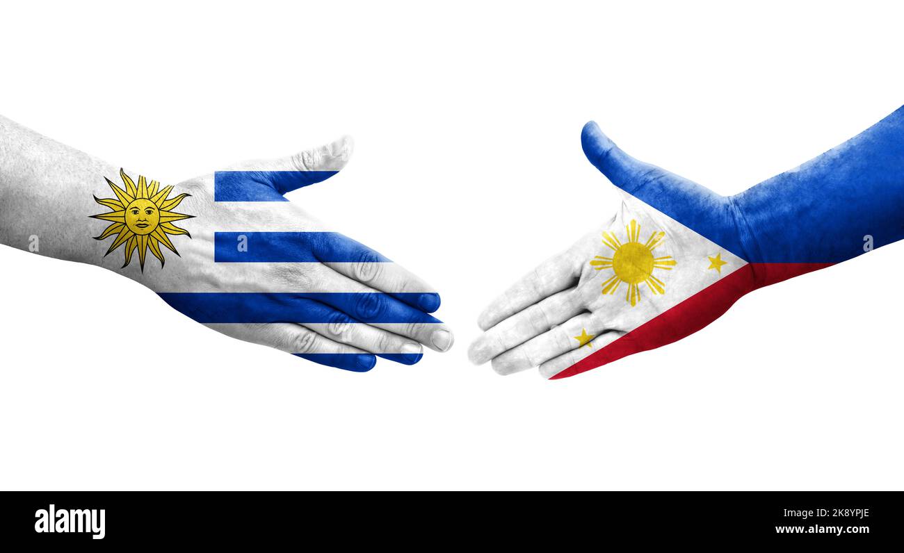 Handshake between Philippines and Uruguay flags painted on hands ...