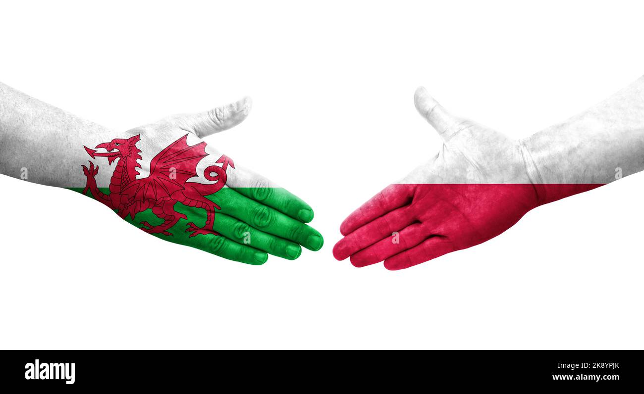 Handshake between Poland and Wales flags painted on hands, isolated ...