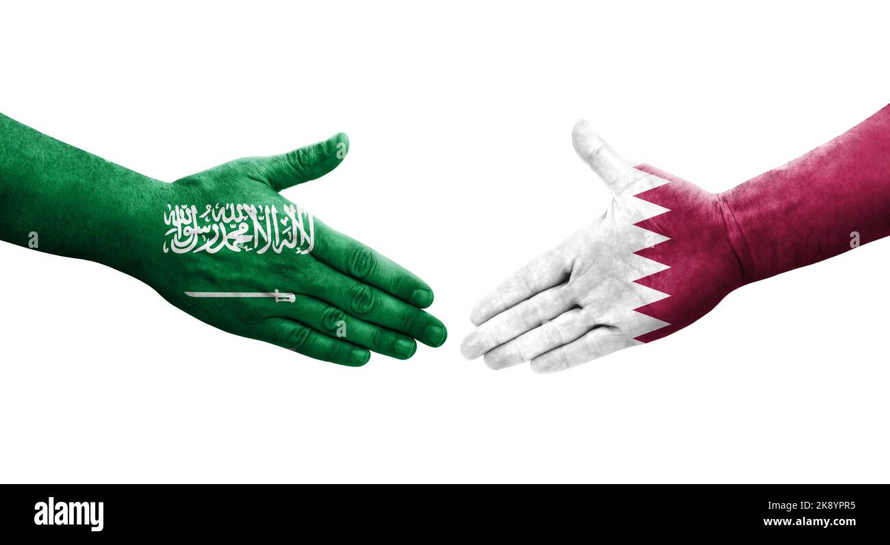Handshake between Qatar and Saudi Arabia flags painted on hands ...
