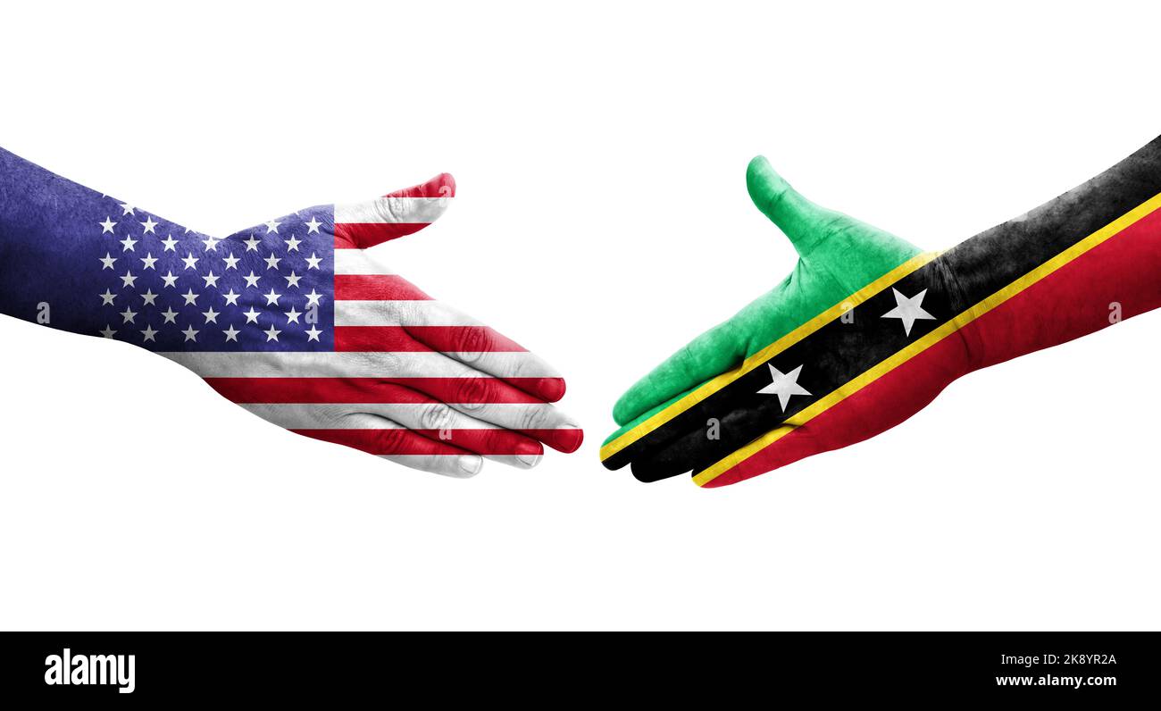 Handshake between Saint Kitts and Nevis and USA flags painted on hands ...