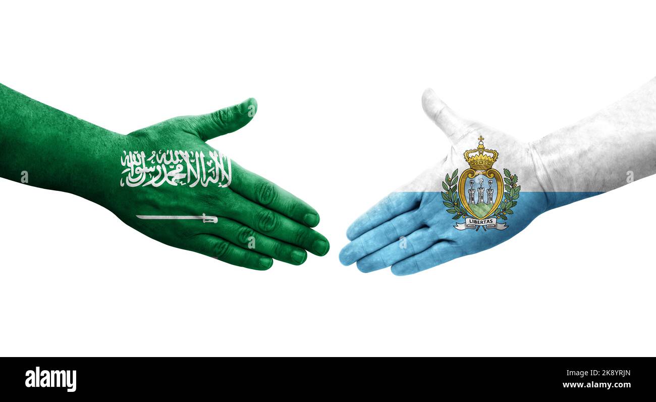 Handshake between San Marino and Saudi Arabia flags painted on hands ...