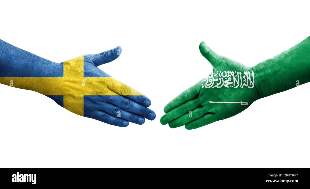 Handshake between Saudi Arabia and Sweden flags painted on hands ...