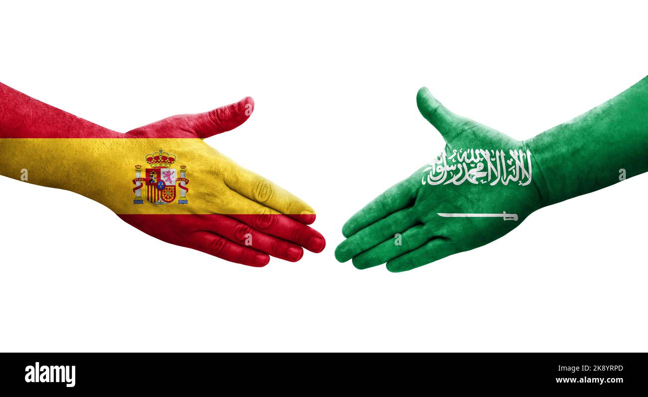 Handshake between Saudi Arabia and Spain flags painted on hands ...