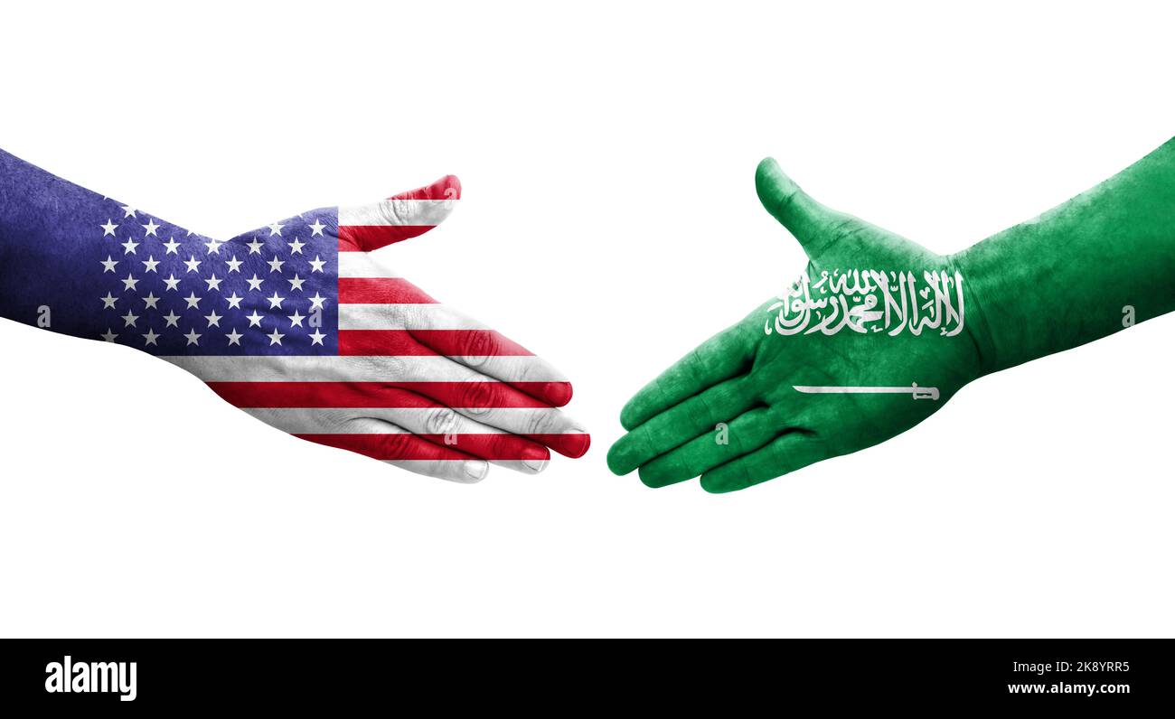 Handshake between Saudi Arabia and USA flags painted on hands, isolated ...