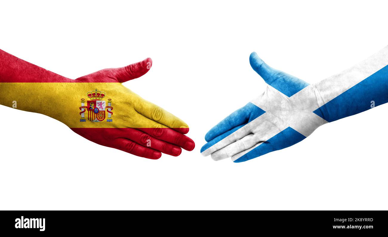 Handshake between Scotland and Spain flags painted on hands, isolated ...
