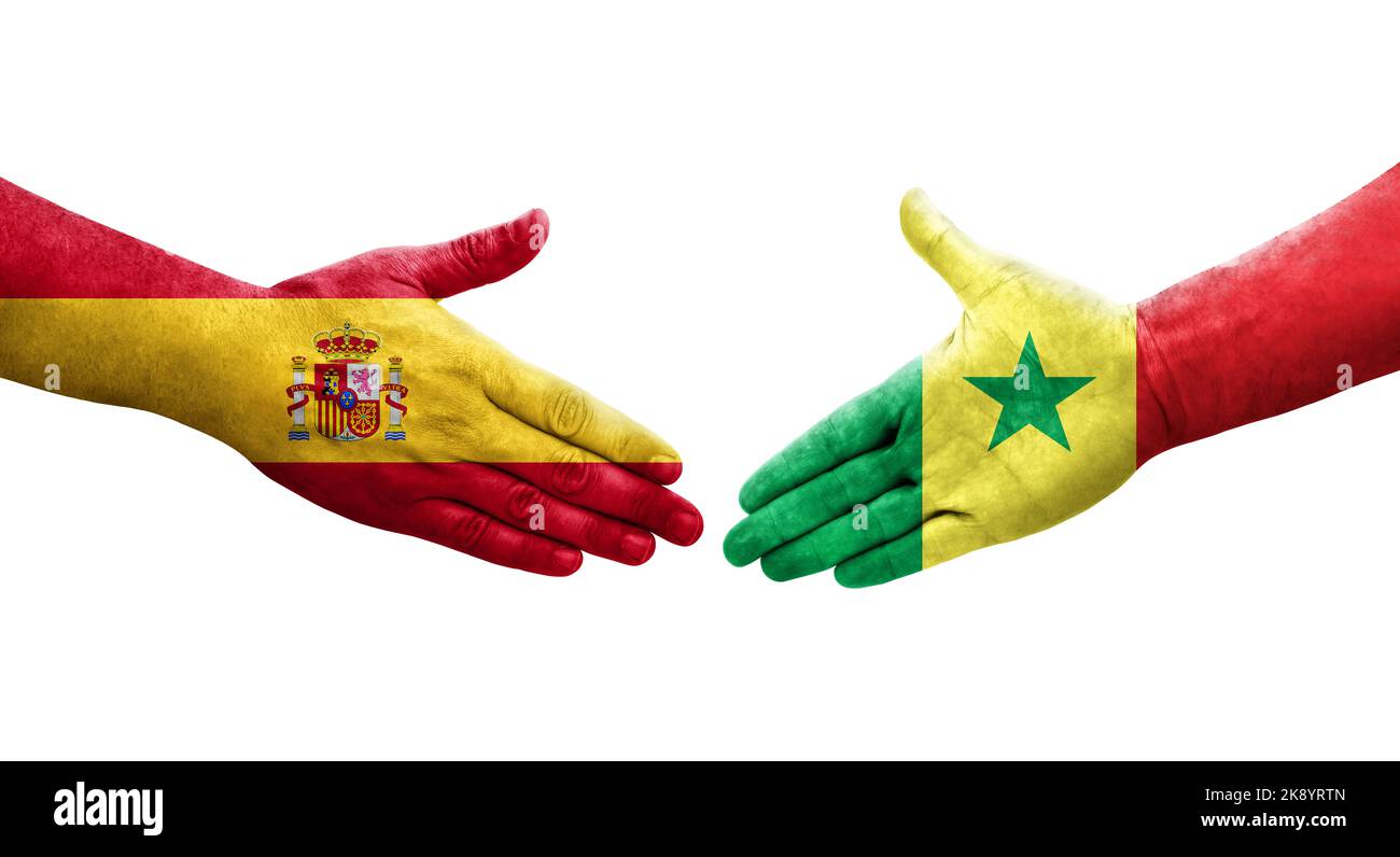 Handshake between Senegal and Spain flags painted on hands, isolated ...