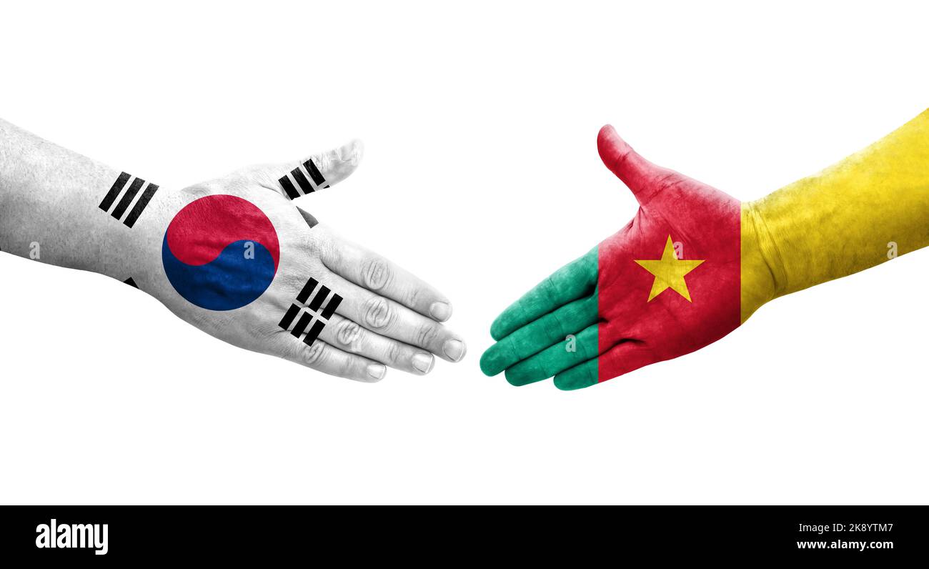 Handshake between South Korea and Cameroon flags painted on hands ...