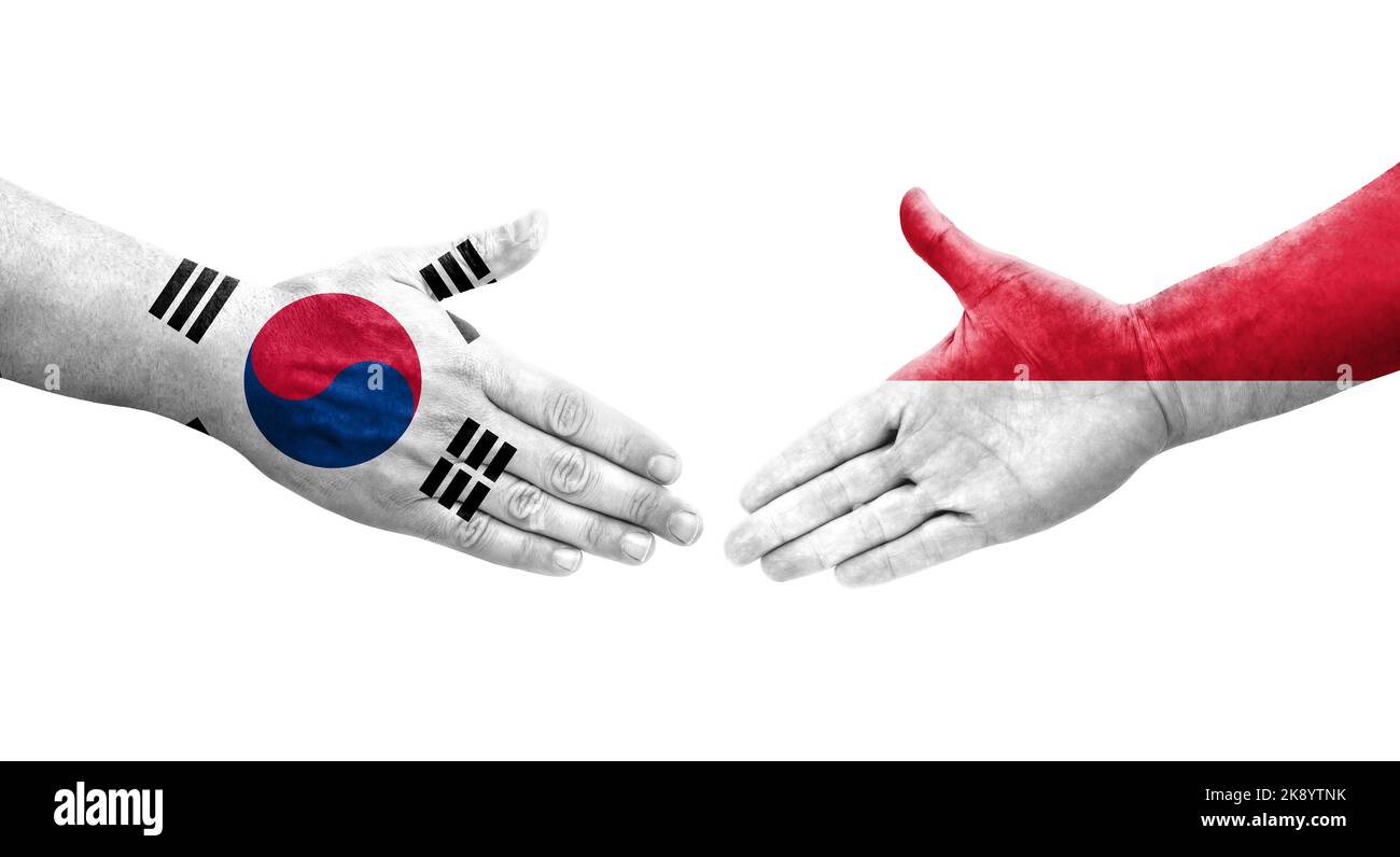 Handshake between South Korea and Monaco flags painted on hands ...