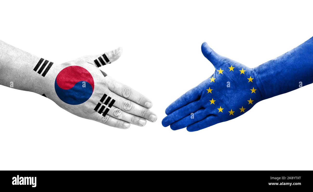 Handshake between South Korea and European Union flags painted on hands ...