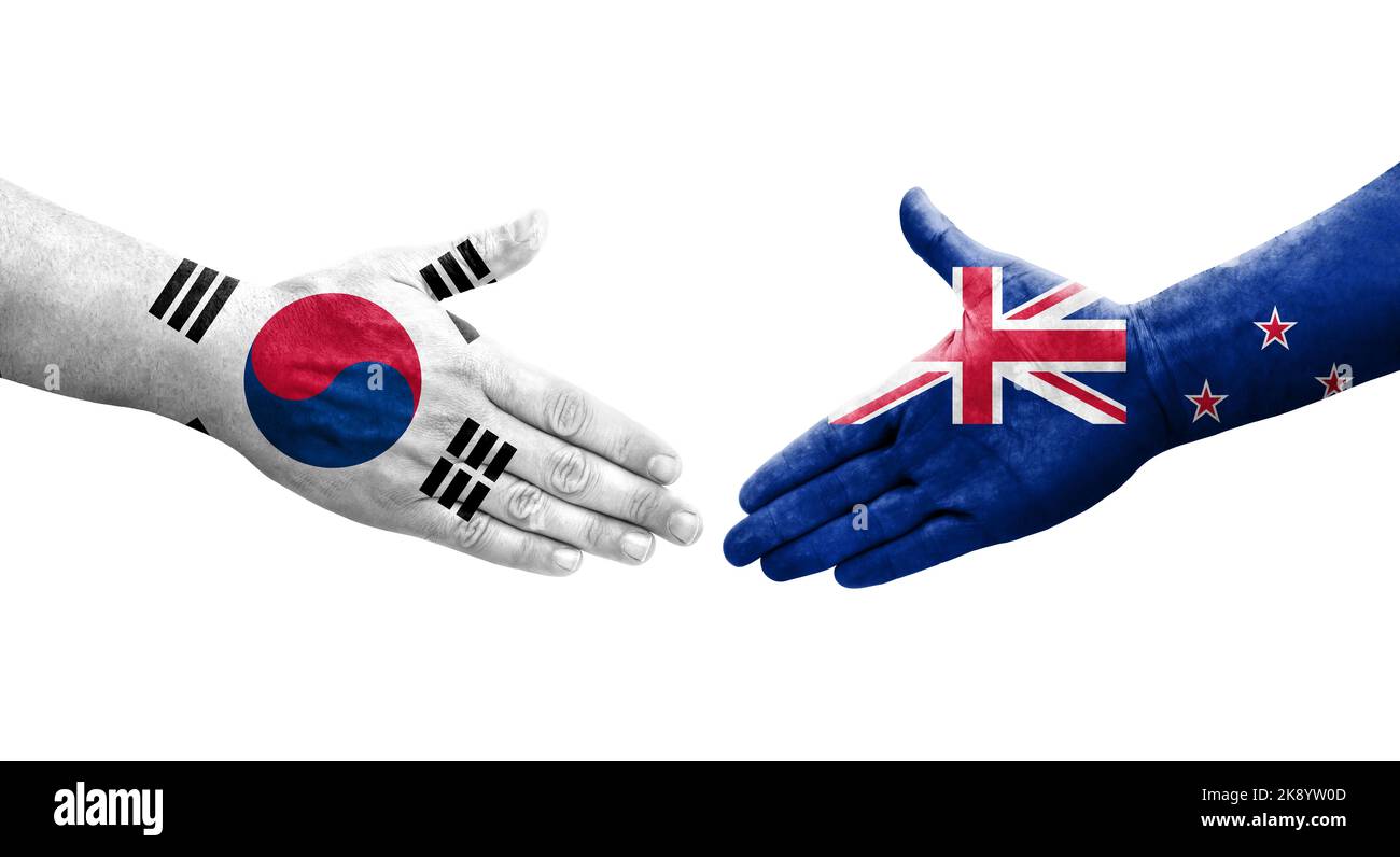 Handshake between South Korea and New Zealand flags painted on hands ...