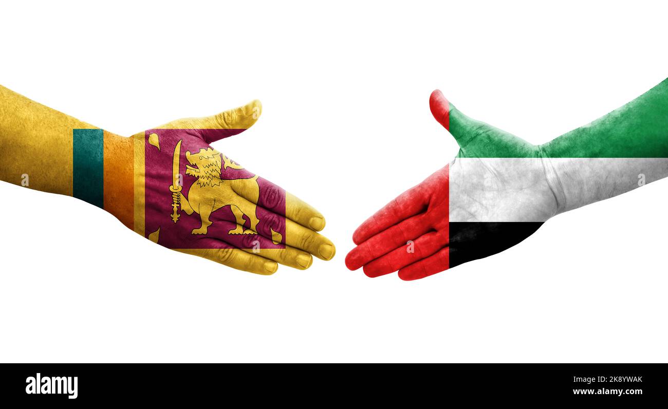 Handshake between Sri Lanka and UAE flags painted on hands, isolated ...