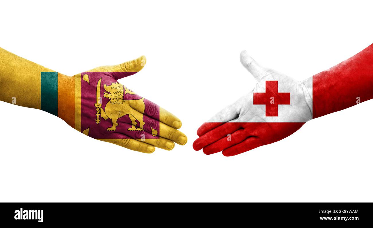 Handshake between Sri Lanka and Tonga flags painted on hands, isolated ...
