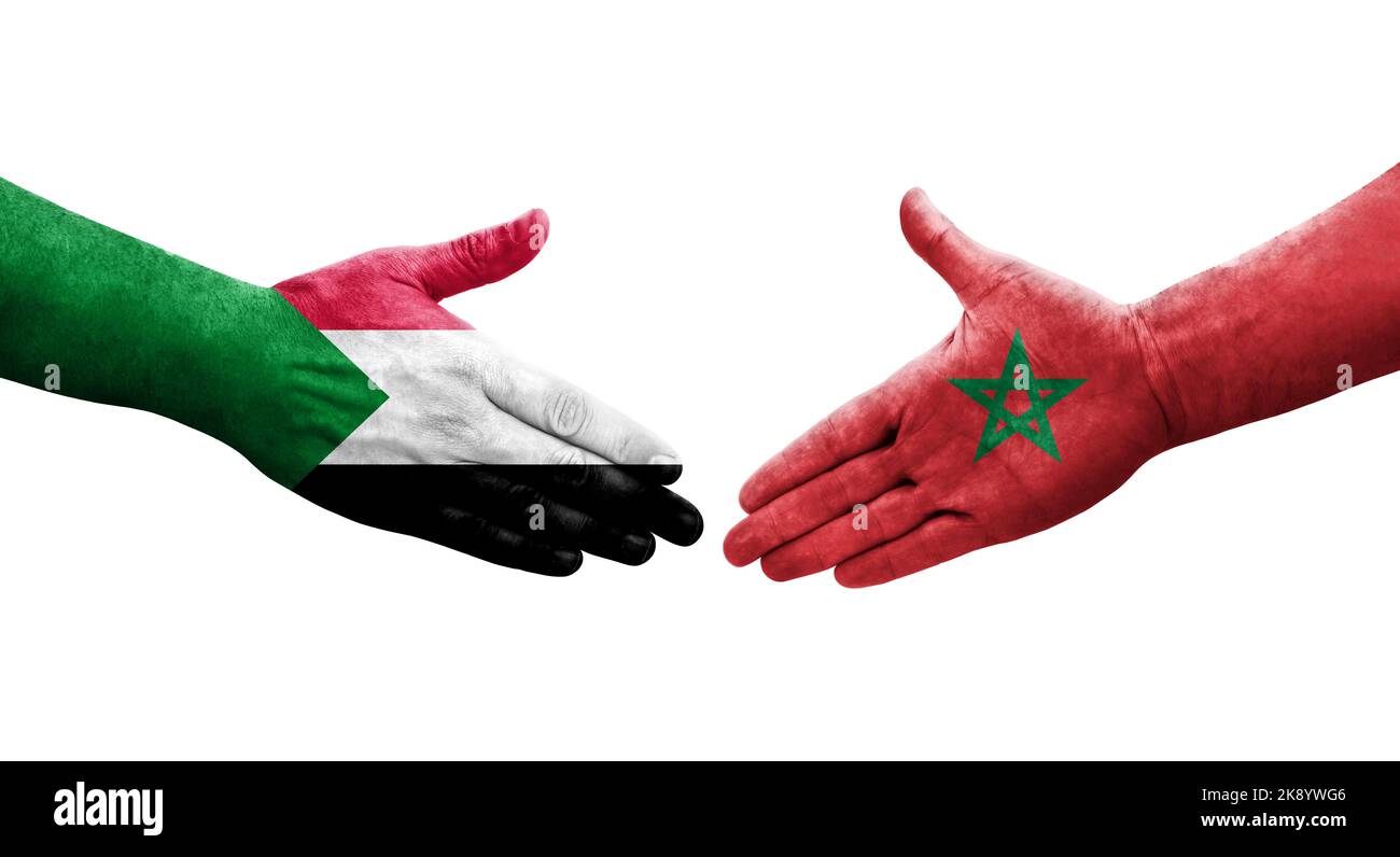 Handshake between Sudan and Morocco flags painted on hands, isolated ...