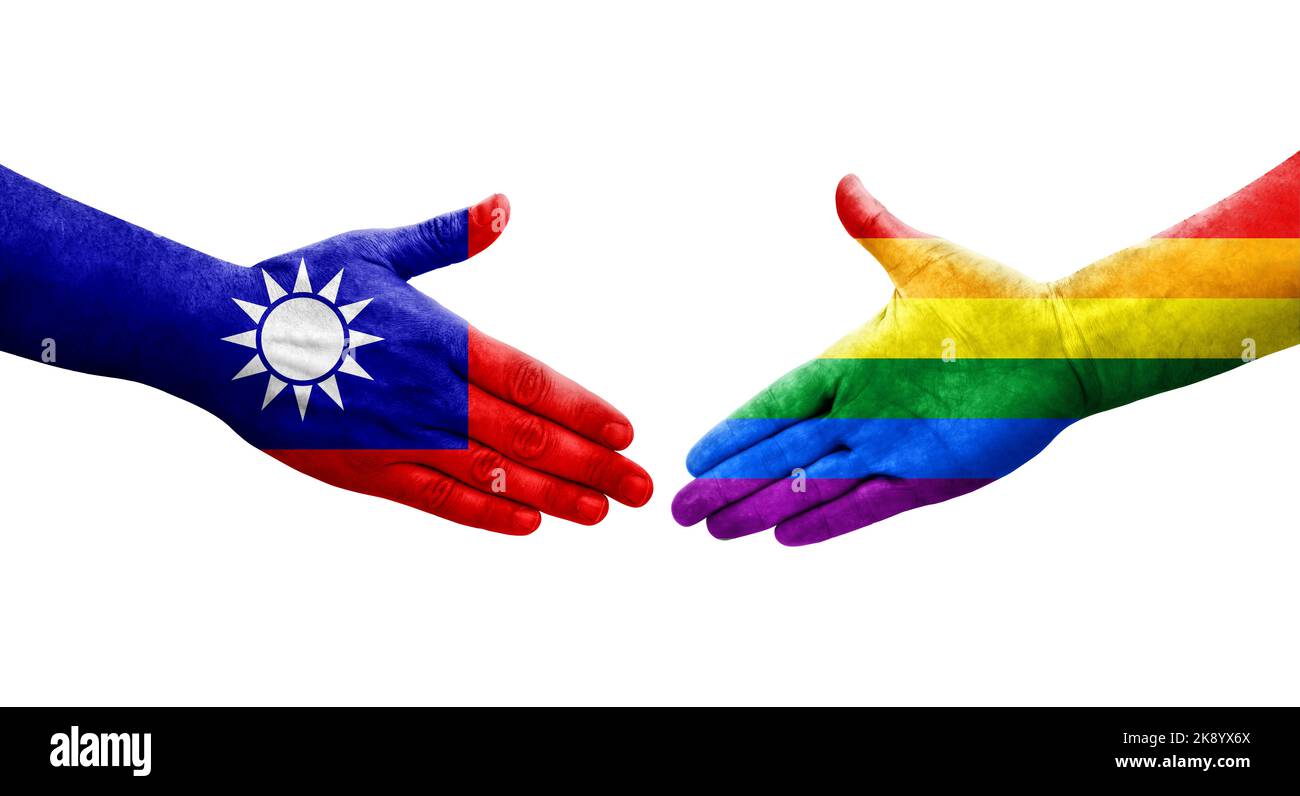 Handshake between Taiwan and LGBT flags painted on hands, isolated ...
