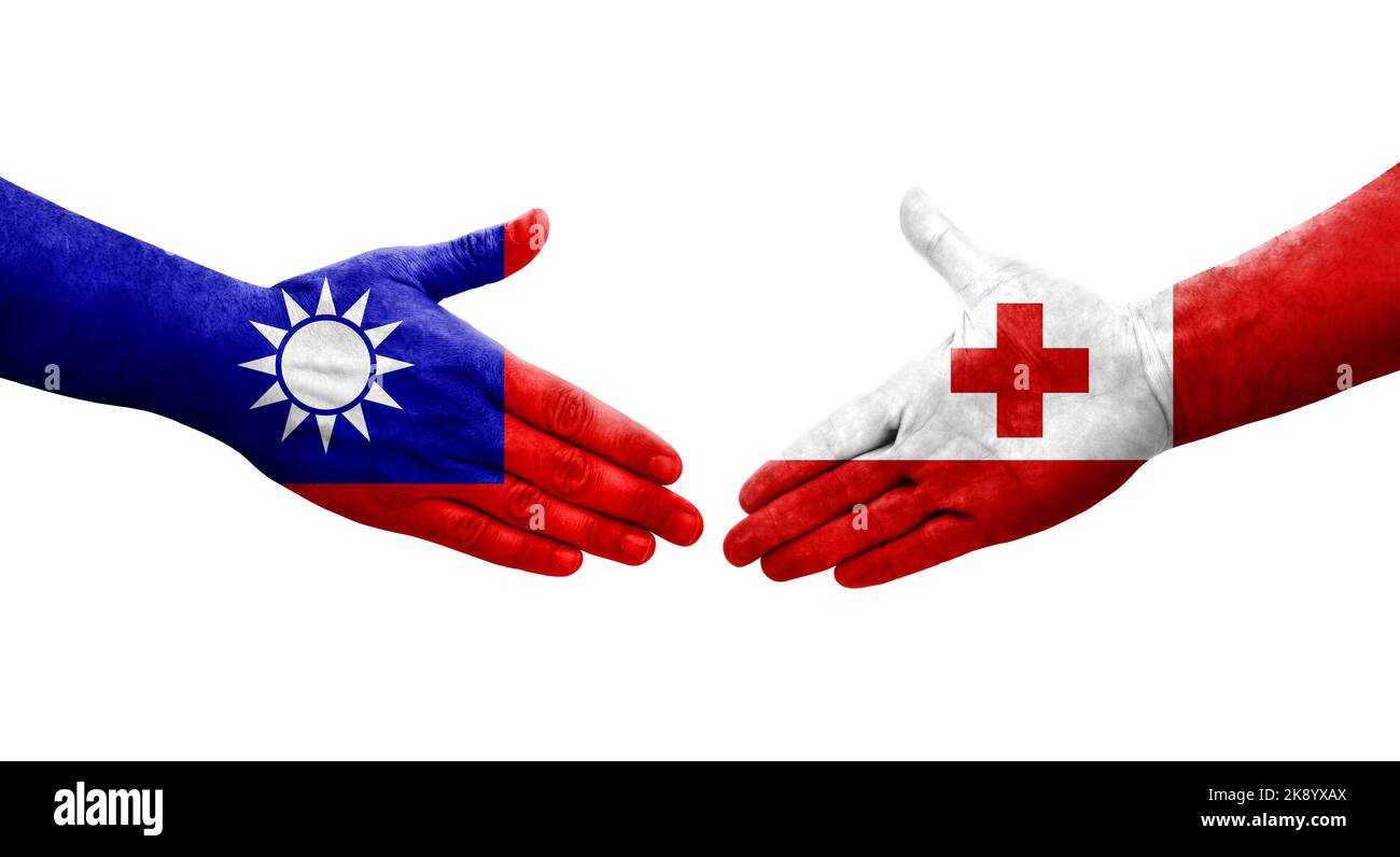 Handshake between Taiwan and Tonga flags painted on hands, isolated ...