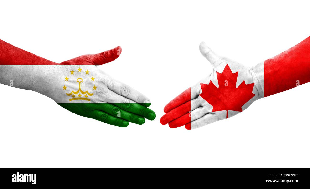 Handshake between Tajikistan and Canada flags painted on hands ...