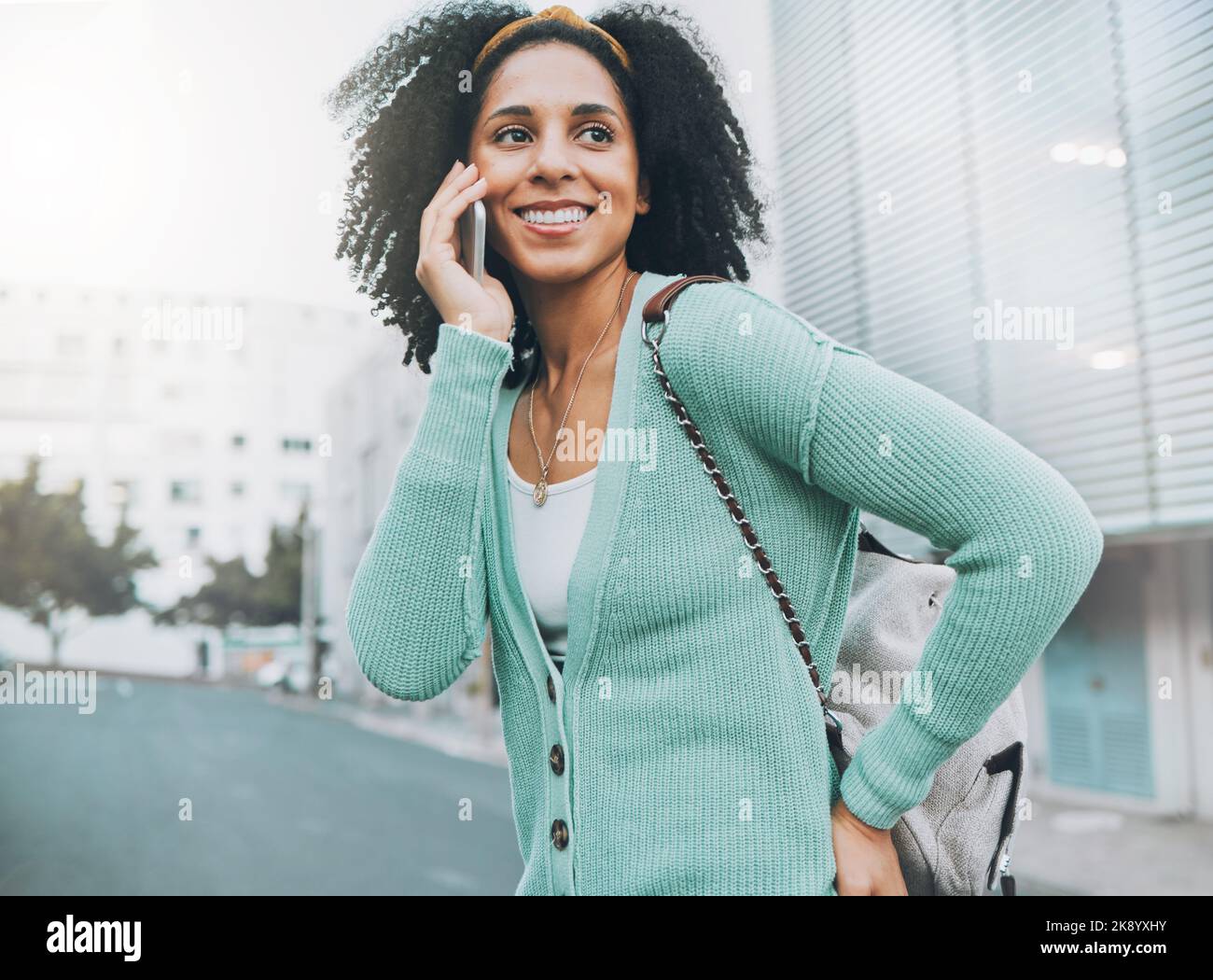 Phone call, smile or black woman in city, street or travel with communication, networking or 5g ...