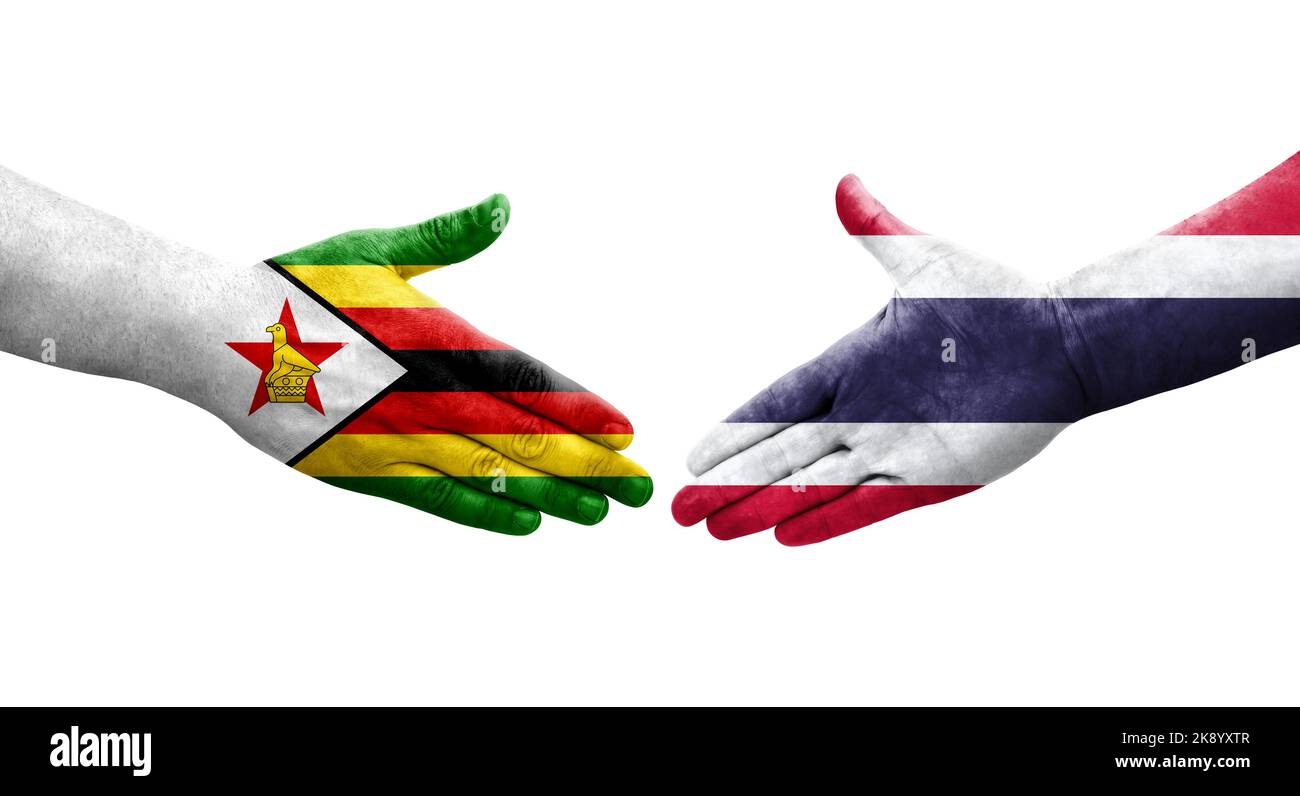 Handshake between Thailand and Zimbabwe flags painted on hands ...
