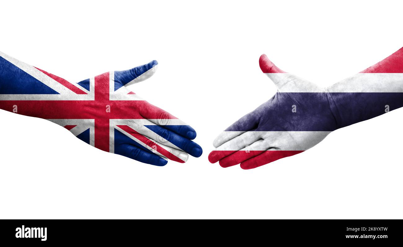 Handshake between Thailand and United Kingdom flags painted on hands ...
