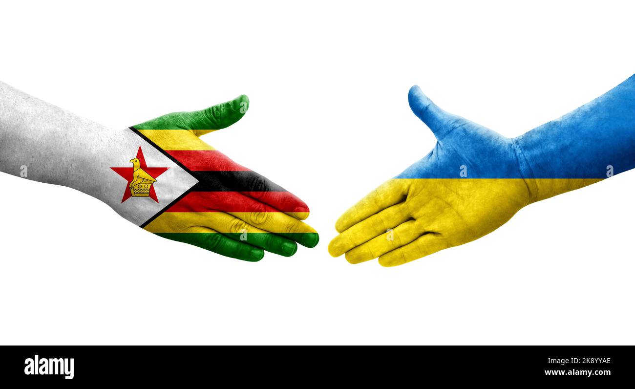 Handshake between Ukraine and Zimbabwe flags painted on hands, isolated ...