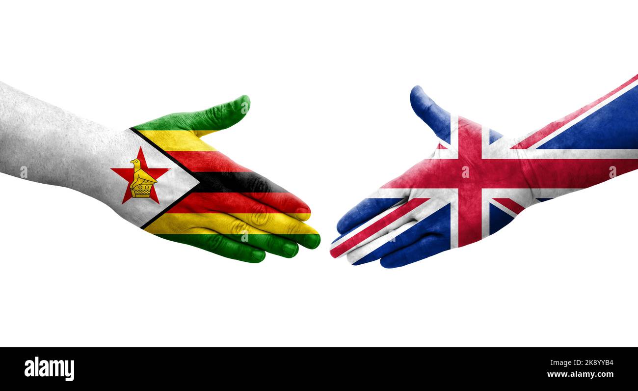 Handshake between United Kingdom and Zimbabwe flags painted on hands ...