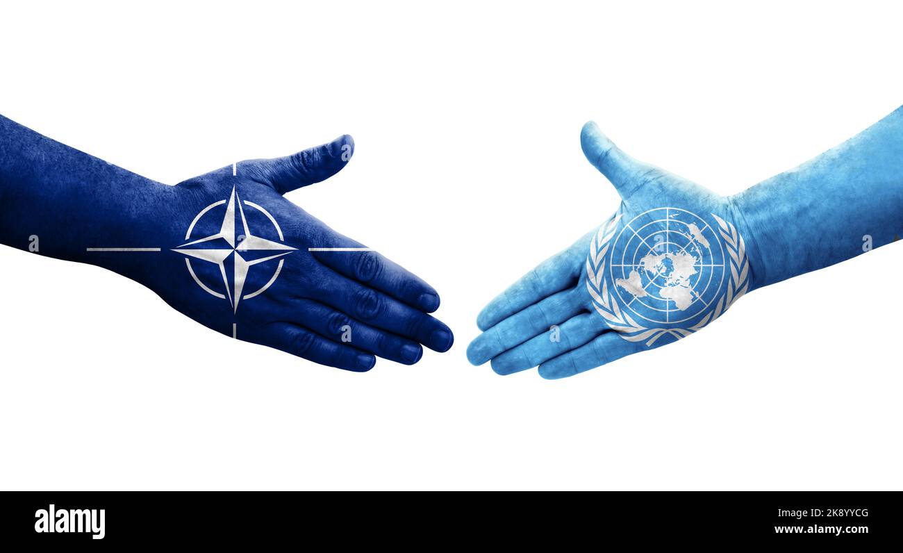 Handshake between United Nations and Nato flags painted on hands ...