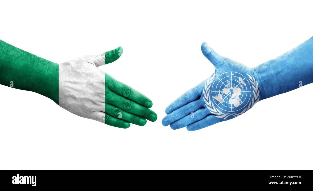 Handshake between United Nations and Nigeria flags painted on hands ...