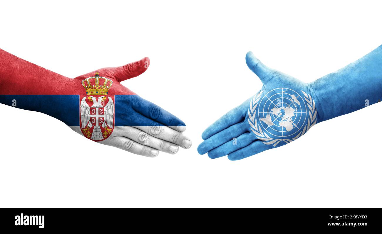 Handshake between United Nations and Serbia flags painted on hands ...