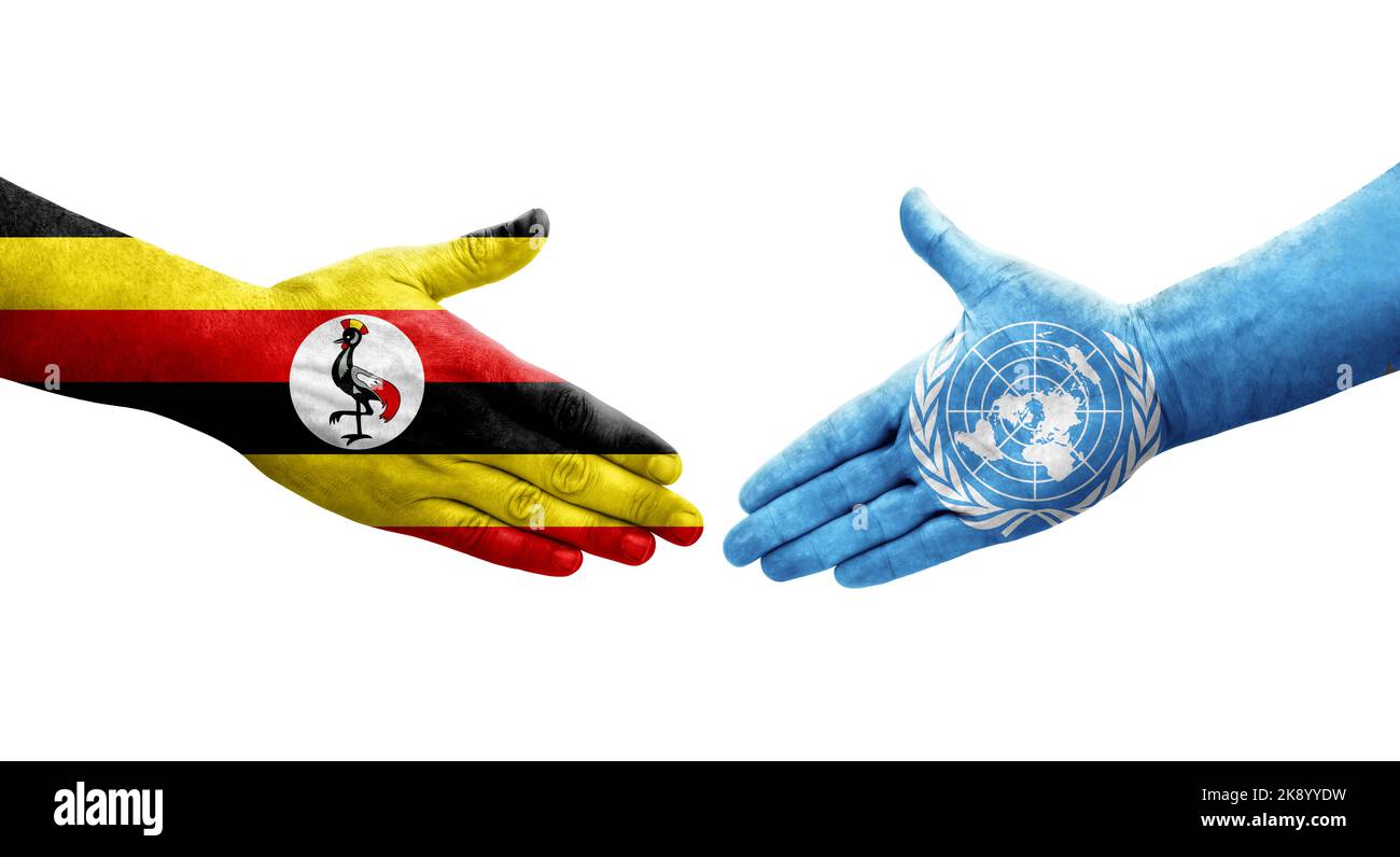 Handshake between United Nations and Uganda flags painted on hands ...