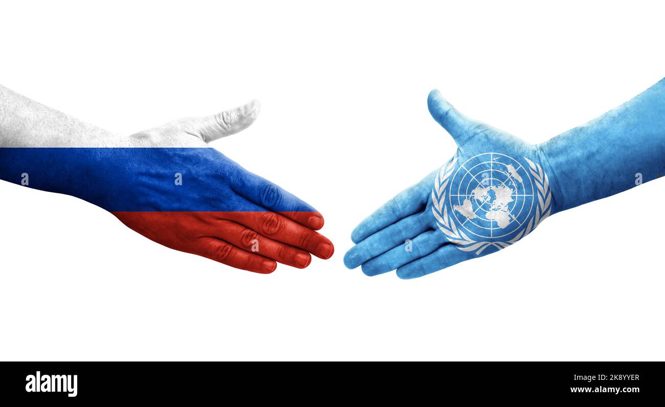 Handshake between United Nations and Russia flags painted on hands ...