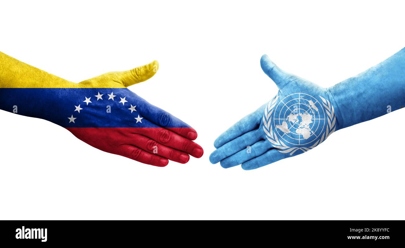 Handshake between United Nations and Venezuela flags painted on hands ...