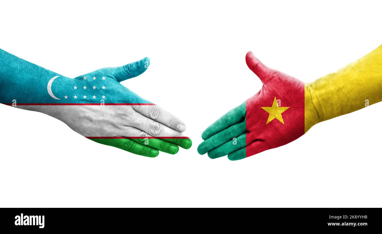 Handshake between Uzbekistan and Cameroon flags painted on hands ...