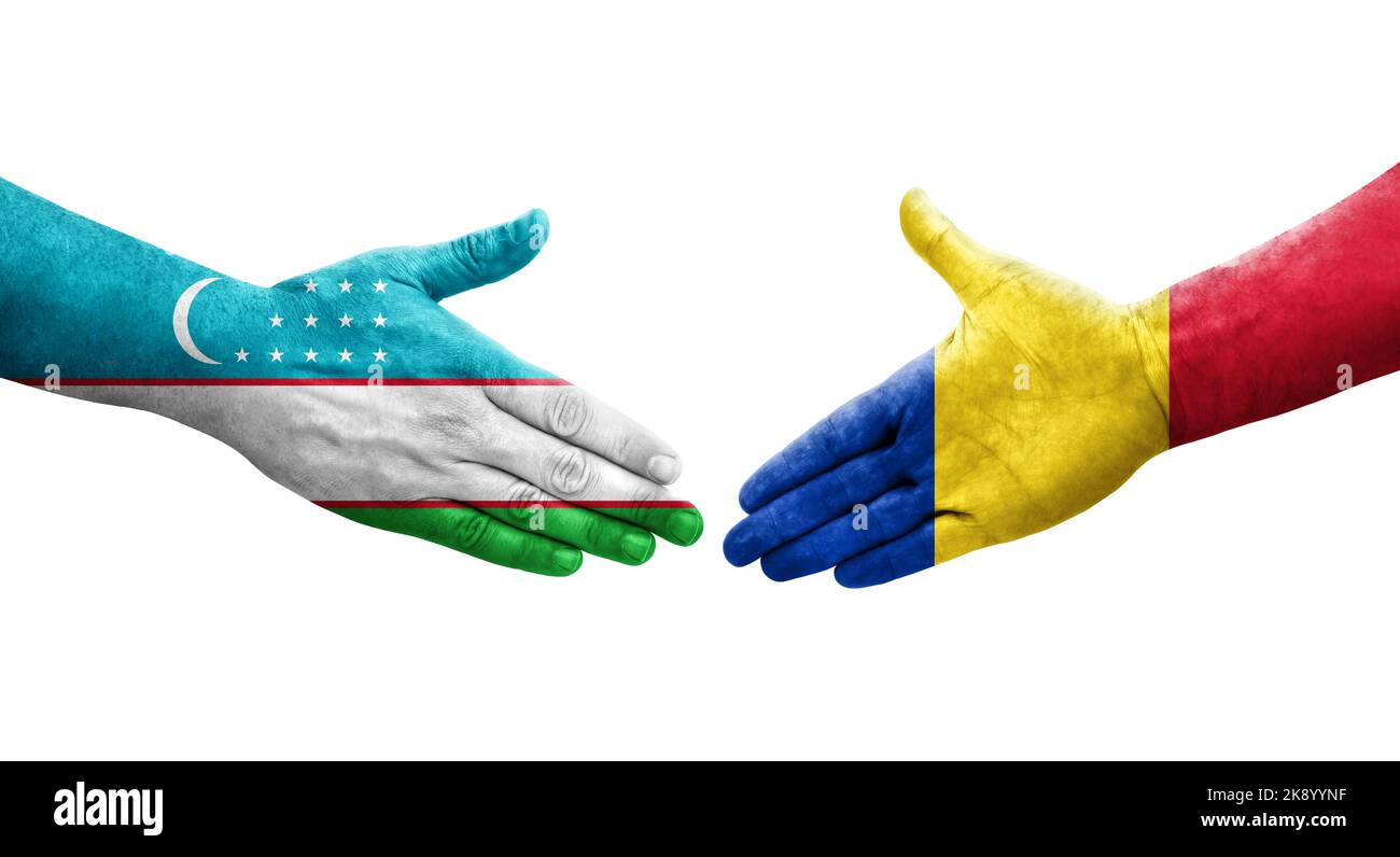 Handshake between Uzbekistan and Romania flags painted on hands ...