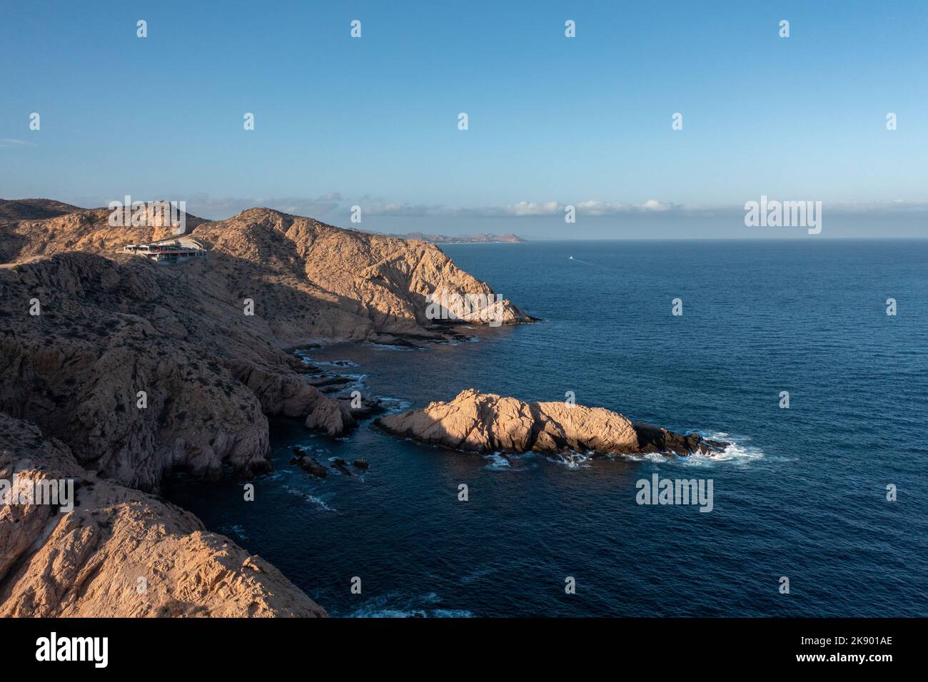The sea stacks on Isla Catalina with a blue sky in the background ...