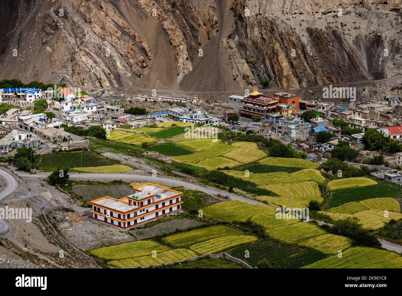 The aerial view of the small village with green fields. Kagbeni, Nepal ...
