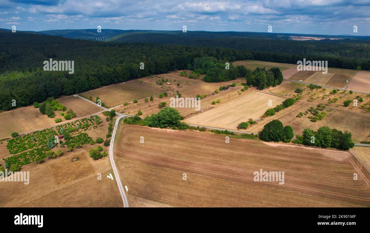 An aerial view of the countryside with farmlands and trees Stock Photo ...