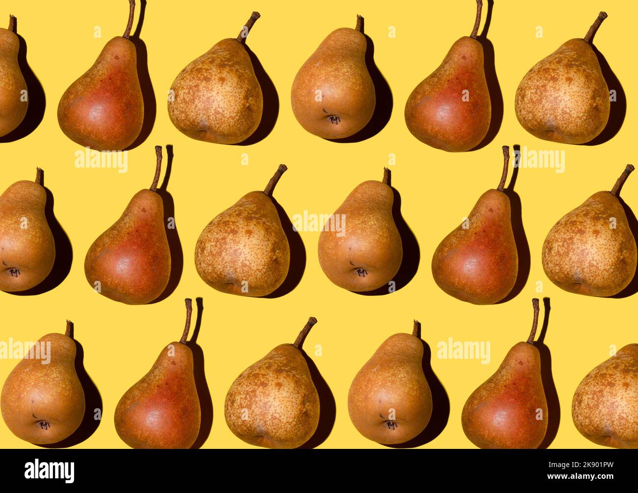 Colorful pear pattern. Orange Bera pears on a yellow background. Ripe ...