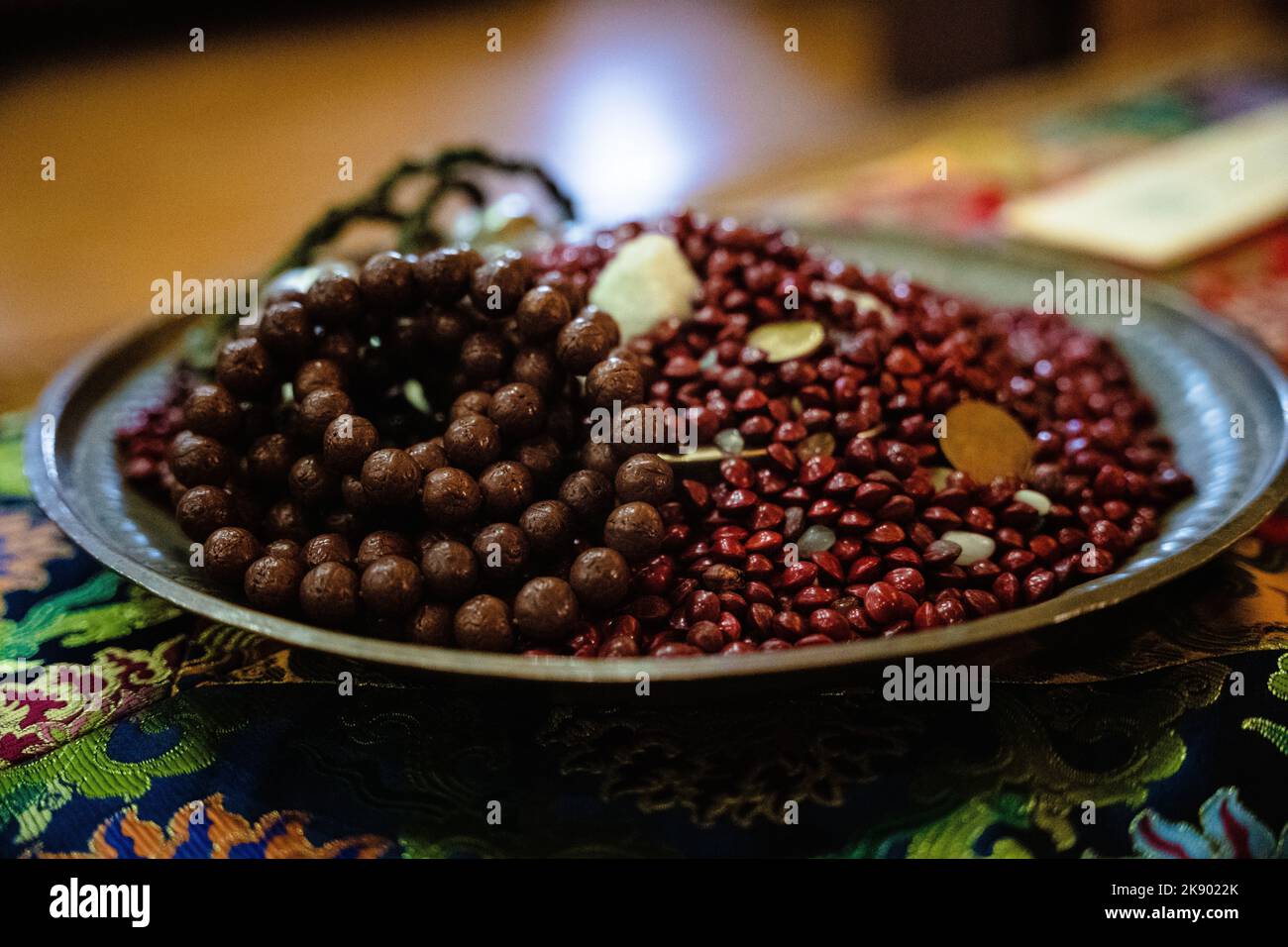 A closeup shot of ritual items' beads at a Buddhist monastery in ...